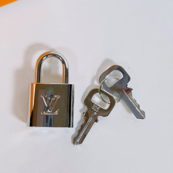 Louis Vuitton | Accessories | Authentic Louis Vuitton Silver Lock And ...